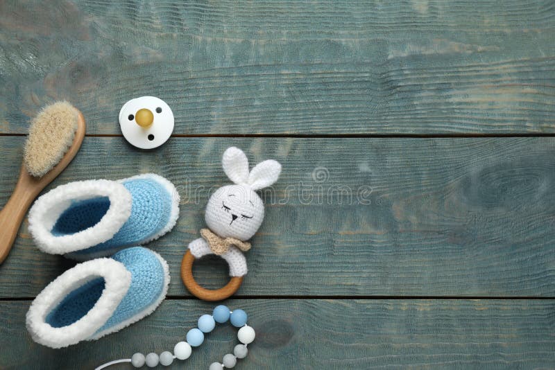 Cute Baby Stuff on Light Blue Wooden Background, Flat Lay. Space for ...