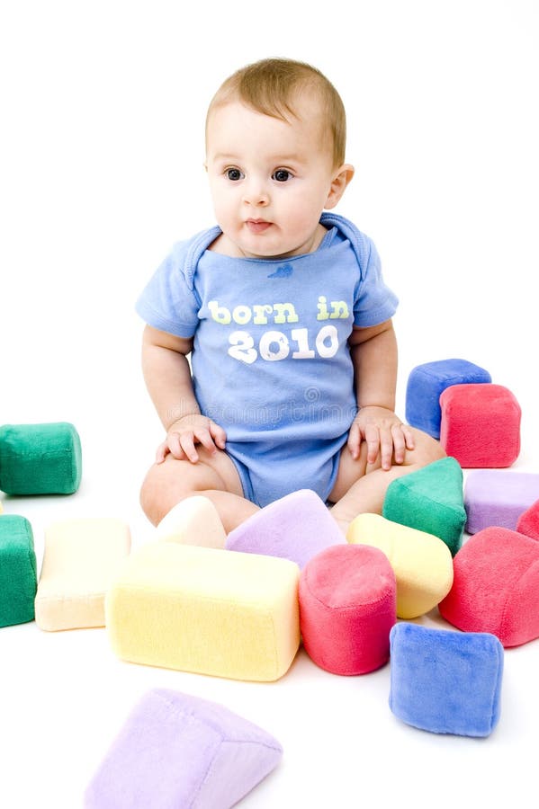 Cute Baby with Toys stock image. Image of born, yellow - 16864291
