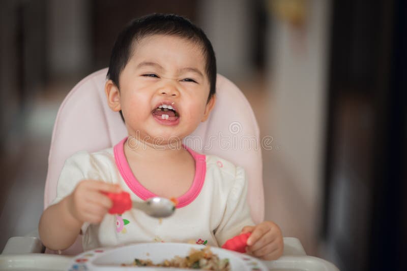 Cute Baby Try To Eating by Herself Stock Image - Image of kitchen ...