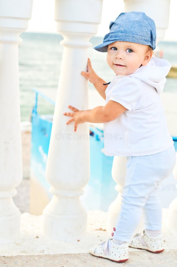 Cute baby trying to walk stock photo. Image of person - 32534156