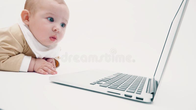 Cute Baby Learns How To Use the Computer Keyboard Stock Video - Video ...