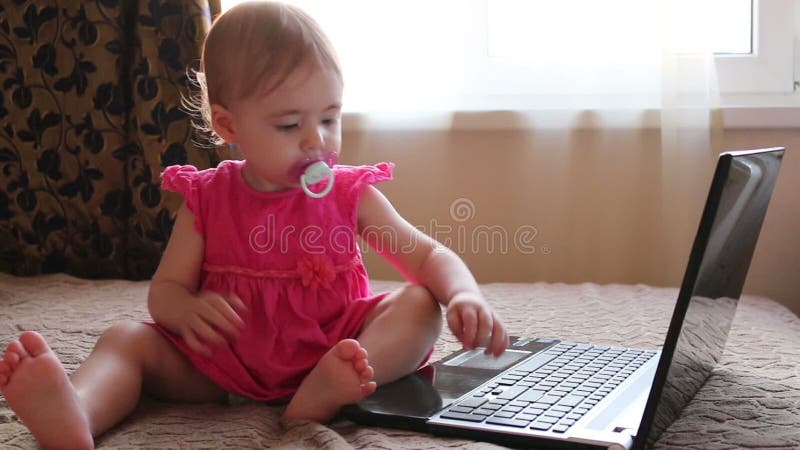 Cute Baby Working on Computer Stock Footage - Video of childhood ...