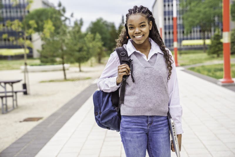 Cute Black Teenager University Student on Campus with Backpack Stock ...