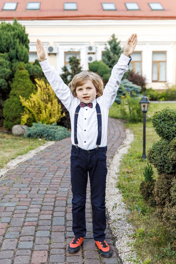 Cute Blond Guy, School Year, Dressed in School Uniform, Takes Her Time ...