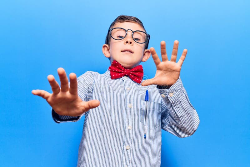 Terrified Nerd. Scared Nerd Lying on the Bed and Looking at Came Stock ...