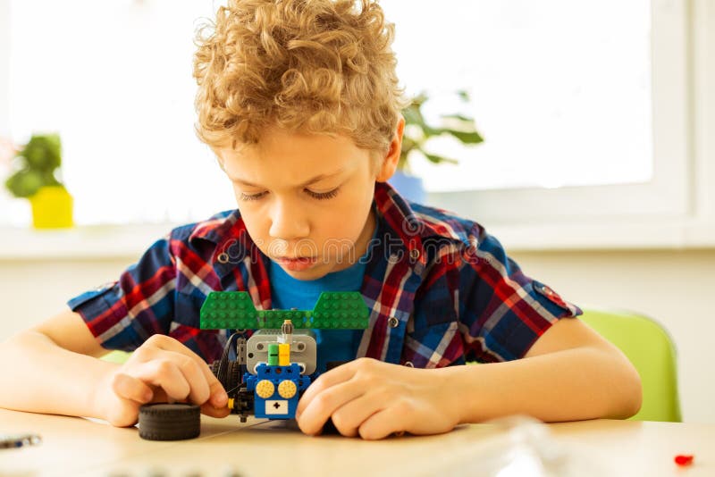 Cute Blonde Boy Working on His Project Stock Image - Image of ...
