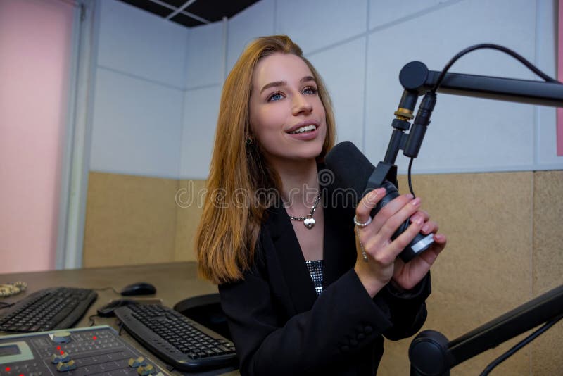 Cute Blonde Girl with Microphone at the Radio Studio Stock Image ...