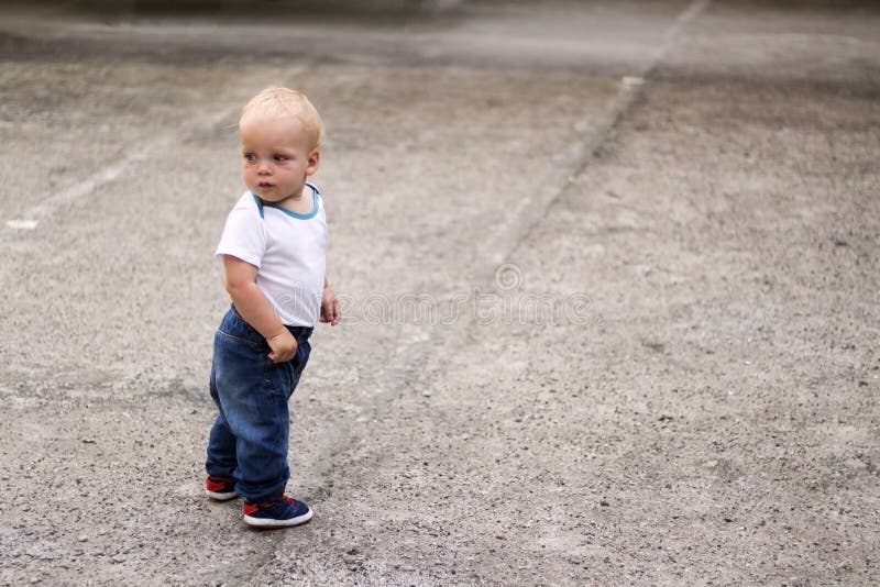 Cute Blonde Kid Looking Looking Back. Awesome Baby Boy on the Walk ...