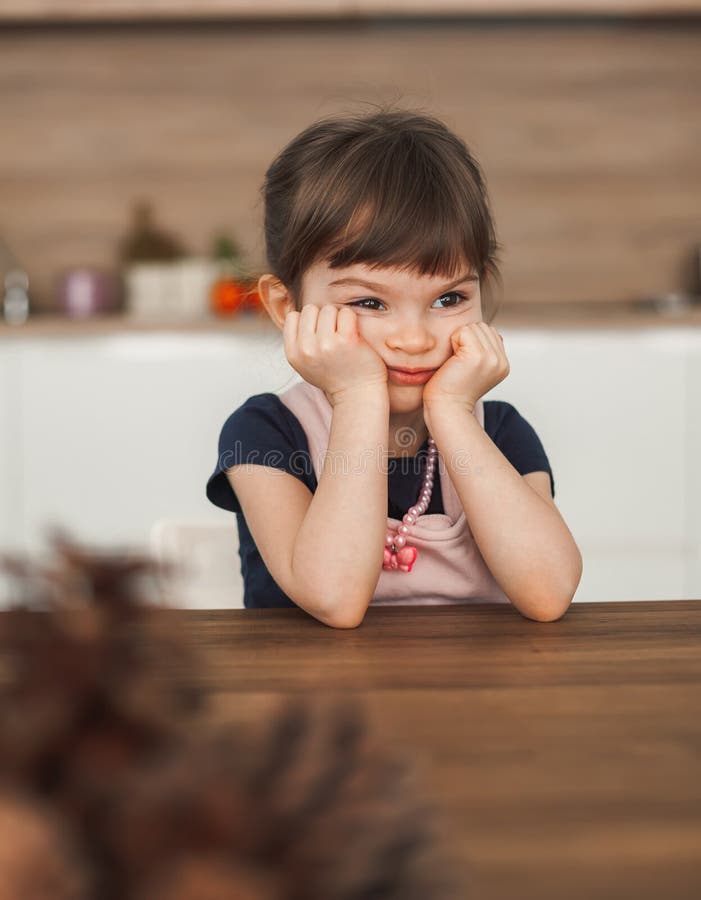 Cute bored little girl stock photo. Image of indoors - 211226834