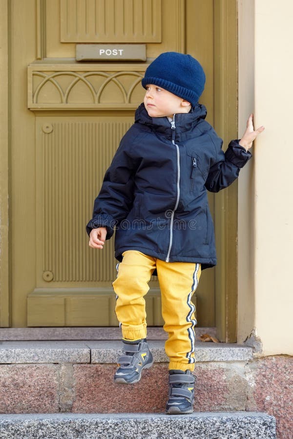 Cute Boy on an Autumn Day at the Door of the Old Post Office Stock ...