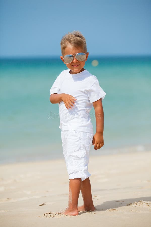 Cute boy on the beach stock photo. Image of joyful, activity - 36185876