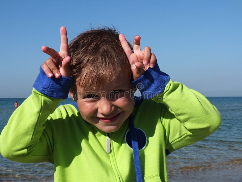 Cute boy on the beach stock photo. Image of person, beauty - 31210004