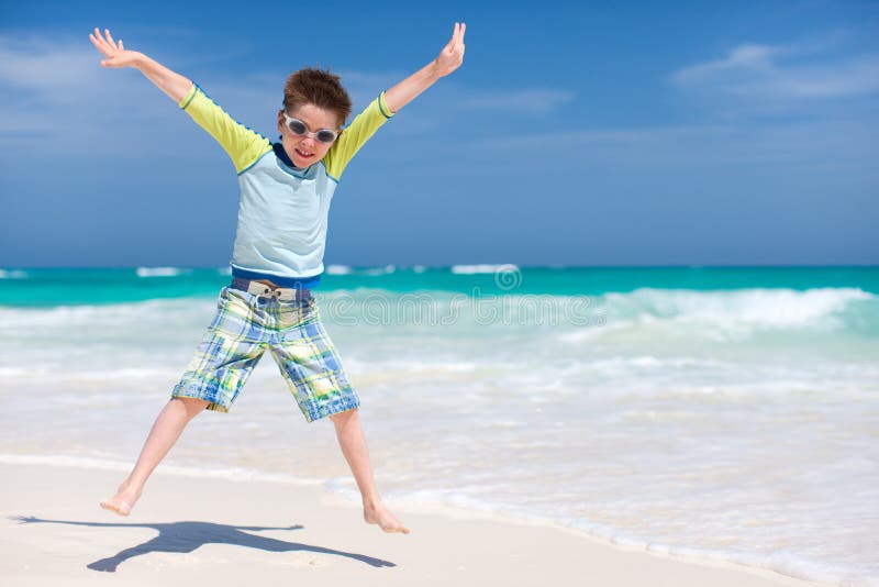 Cute boy at beach stock photo. Image of seaside, seashore - 34023716