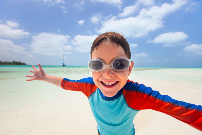 Cute boy at beach stock image. Image of enjoyment, tropical - 34355935
