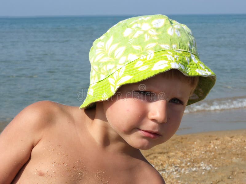 Cute boy on the beach stock image. Image of play, activity - 30582365