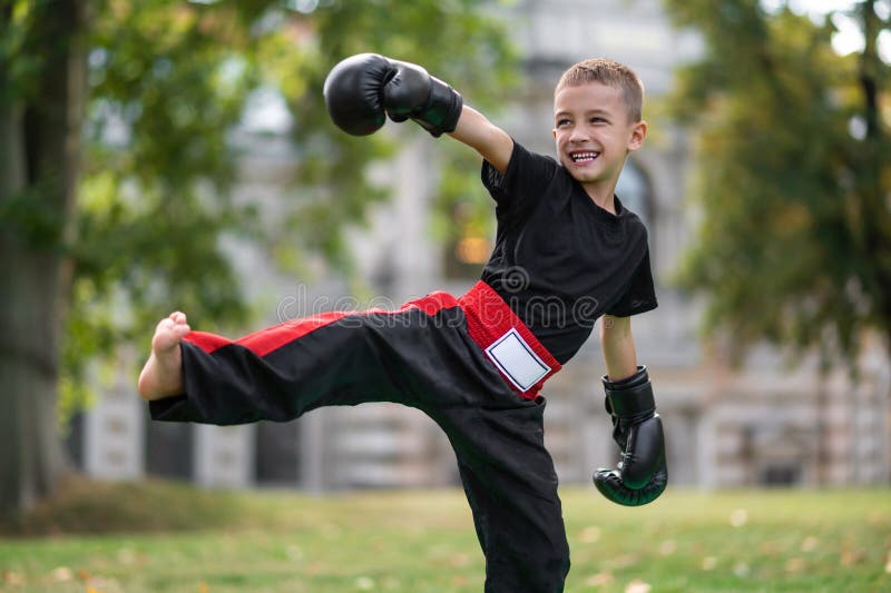 Cute Boy in Boxing Gloves Looking Contented and Excited Stock Image ...