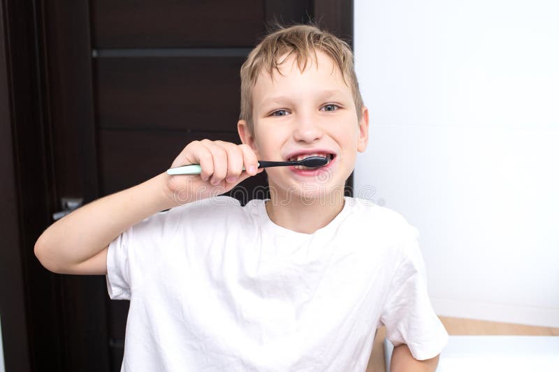 Cute Boy Brushing His Teeth Stock Image - Image of cute, oral: 259884773