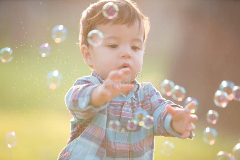 Cute boy with bubble stock photo. Image of gesture, look - 75297292