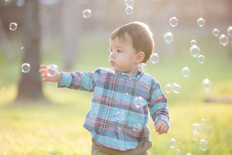 Cute boy with bubble stock image. Image of curious, field - 75299637
