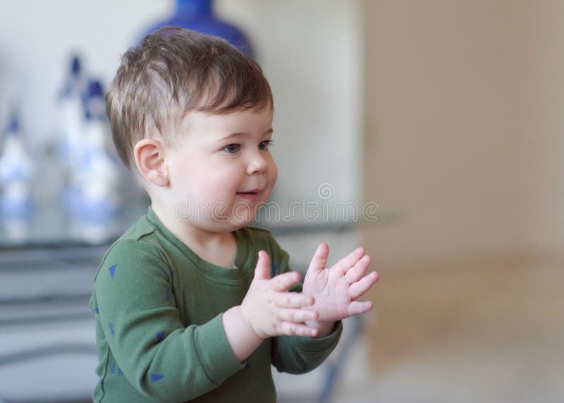Cute Boy Clapping His Hands at Home Stock Photo - Image of cute, baby ...