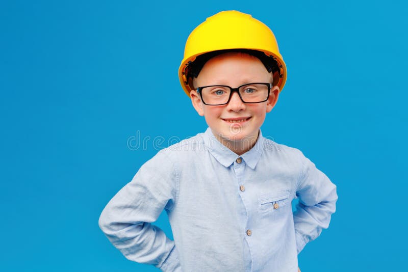 Cute Boy Construction Worker in Yellow Hard Hat Standing in Indoor ...