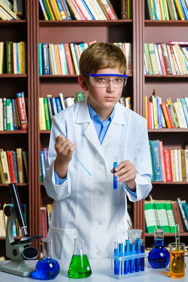 Cute Boy and Girl Doing Biochemistry Research in Stock Image - Image of ...