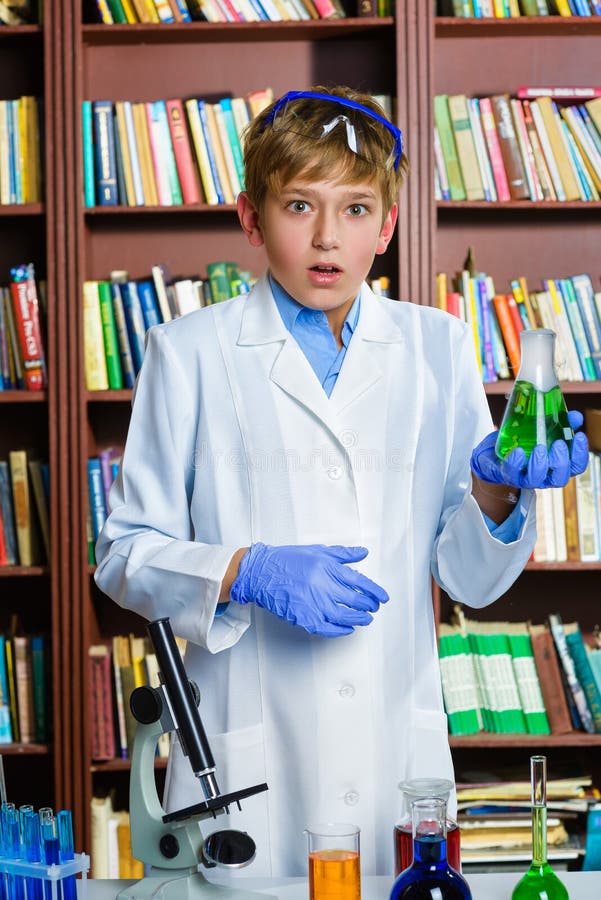 Cute Boy and Girl Doing Biochemistry Research in Stock Image - Image of ...