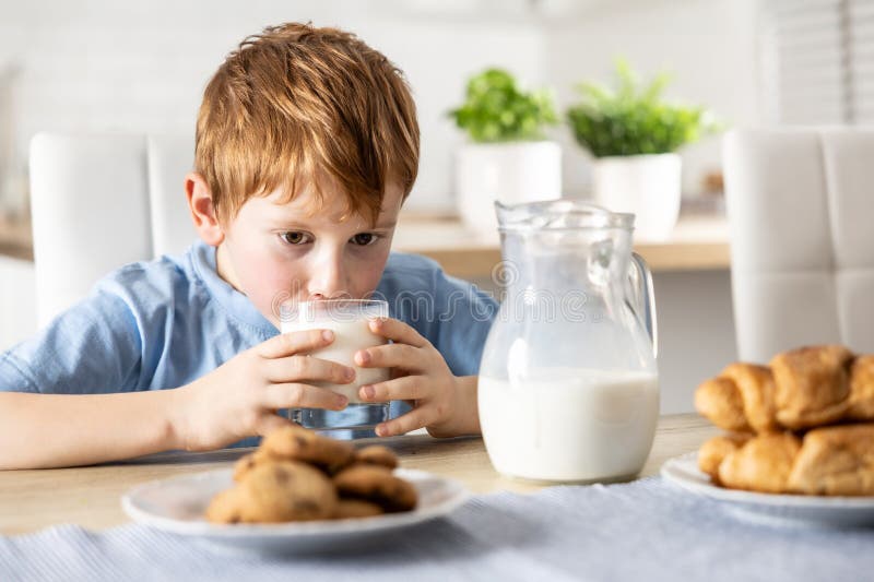 Cute Boy Drinks Fresh Milk for Breakfast Stock Photo - Image of table ...