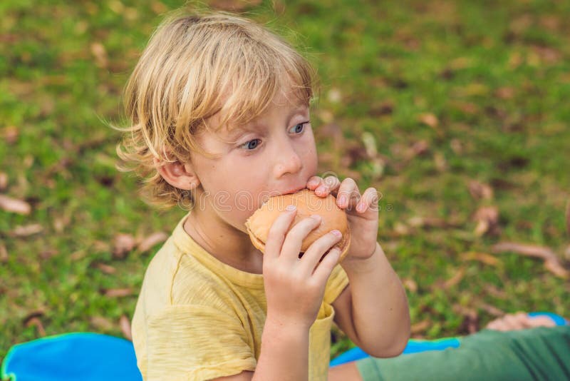 Closeup of boy eating stock image. Image of childhood - 10906817