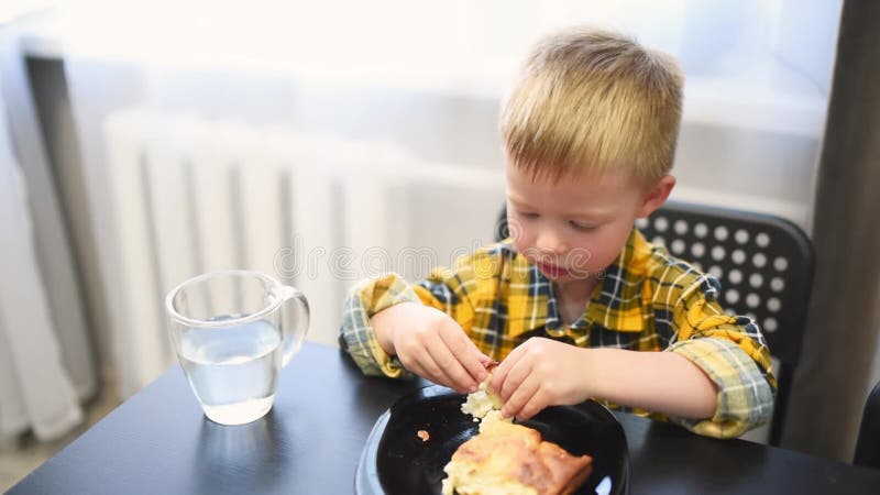Cute Boy Eating Food in the Kitchen Stock Footage - Video of breakfast ...