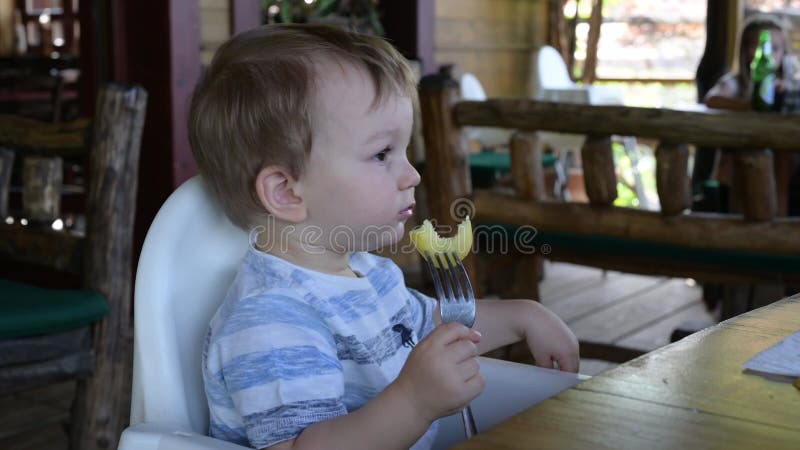 Cute Boy Eating Potatoes Using Fork Stock Footage - Video of cute ...