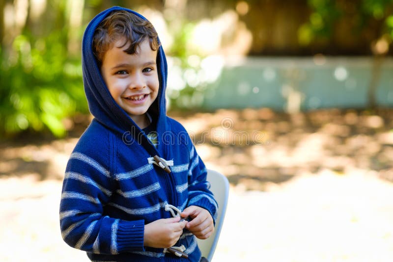 Cute boy outdoors stock image. Image of eyes, green - 107189399