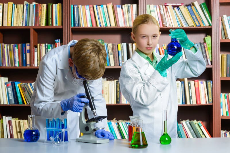 Cute Boy Doing Biochemistry Research in Chemistry Stock Image - Image ...