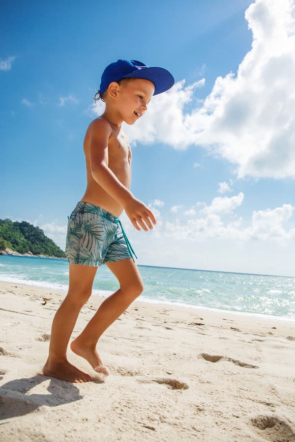 Cute Boy is Having Fun on the Beach Stock Image - Image of caucasian ...