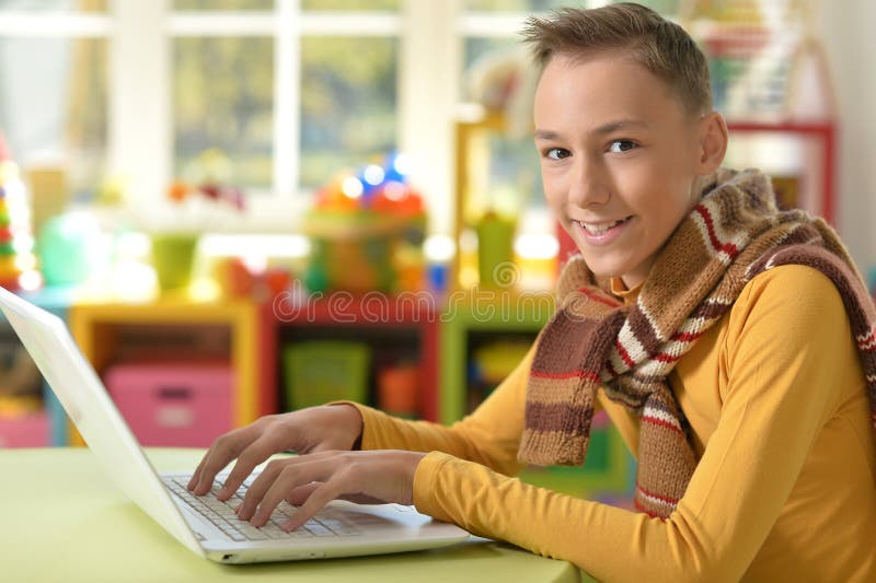 Cute Boy with Laptop at the Table Stock Image - Image of homework ...