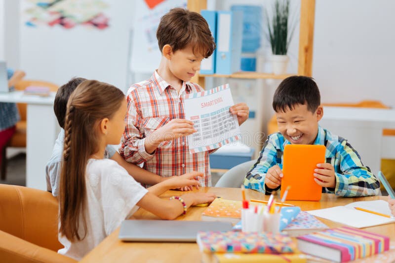 Cute Boy Looking at the Mate Attentively Stock Photo - Image of ...