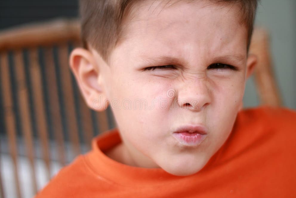 Cute Boy Making a Cheeky Grin Stock Photo - Image of cute, baby: 12409282