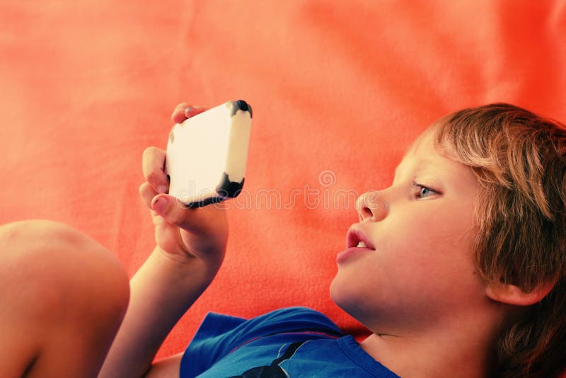 Cute boy with mobile phone stock image. Image of caucasian - 47955447