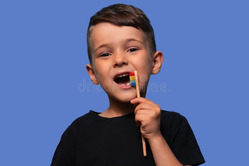 A Cute Boy with No Front Teeth. with a Toothbrush in Hand. Dental ...