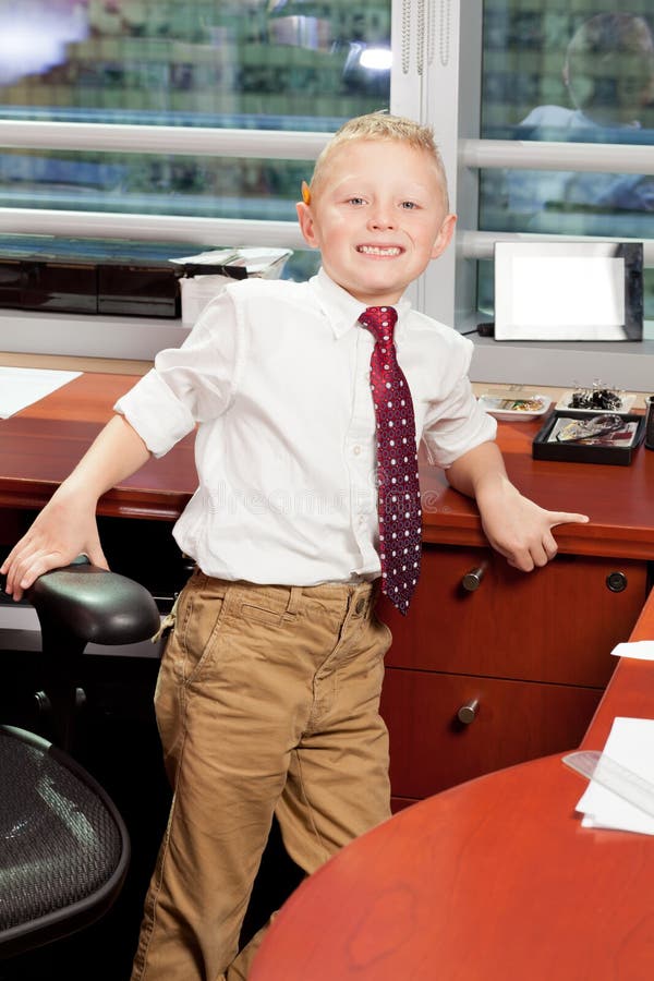 Cute boy in office stock image. Image of eyes, smiling - 21353973
