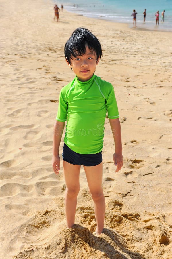 Cute Boy Playing on the Beach Stock Image - Image of chinese, activity ...