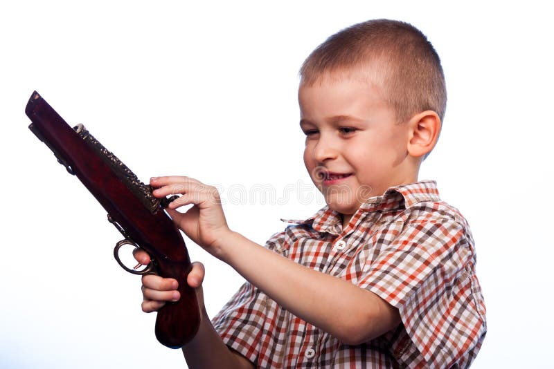 Cute Boy Playing With The Gun Stock Image - Image of male, handgun ...