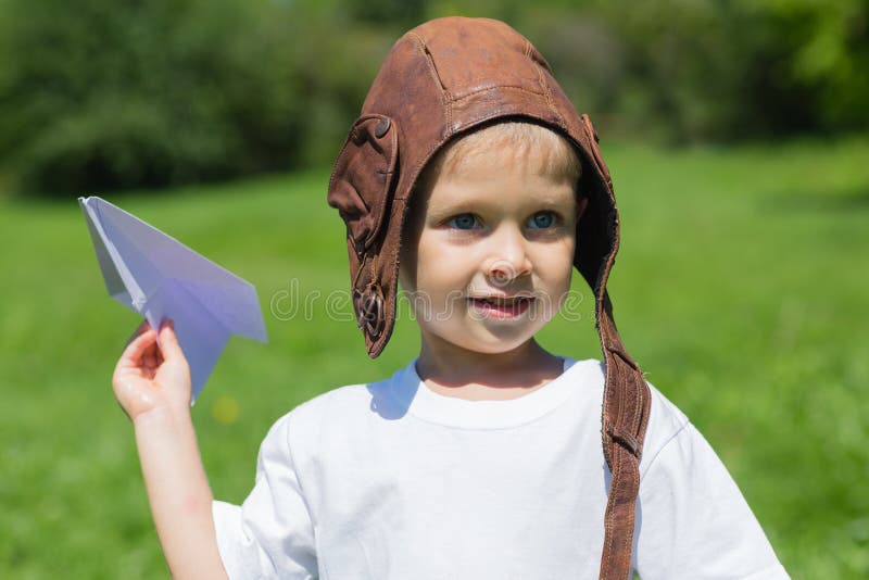 Cute Boy Playing with Paper Plane Stock Image - Image of people, person ...