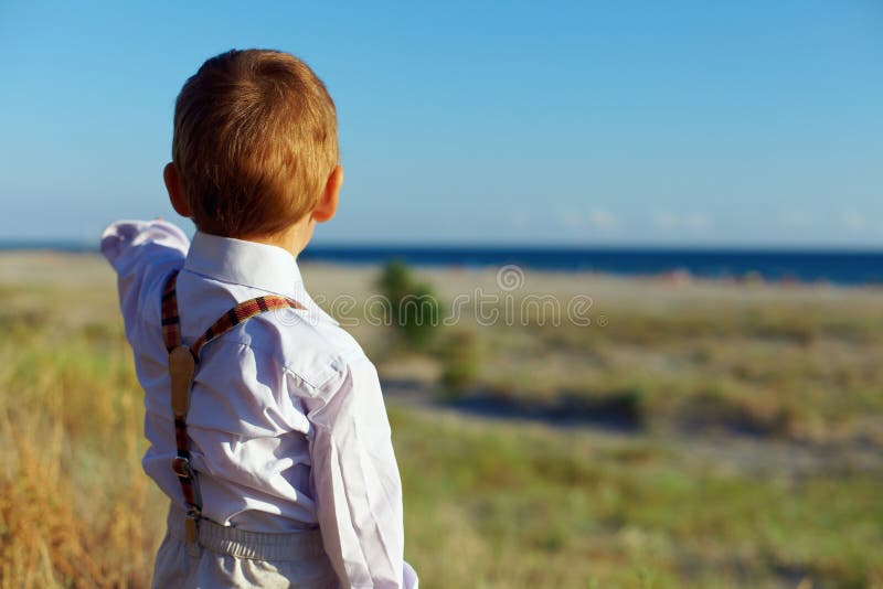 Cute Boy Pointing Something on the Distance Stock Image - Image of ...
