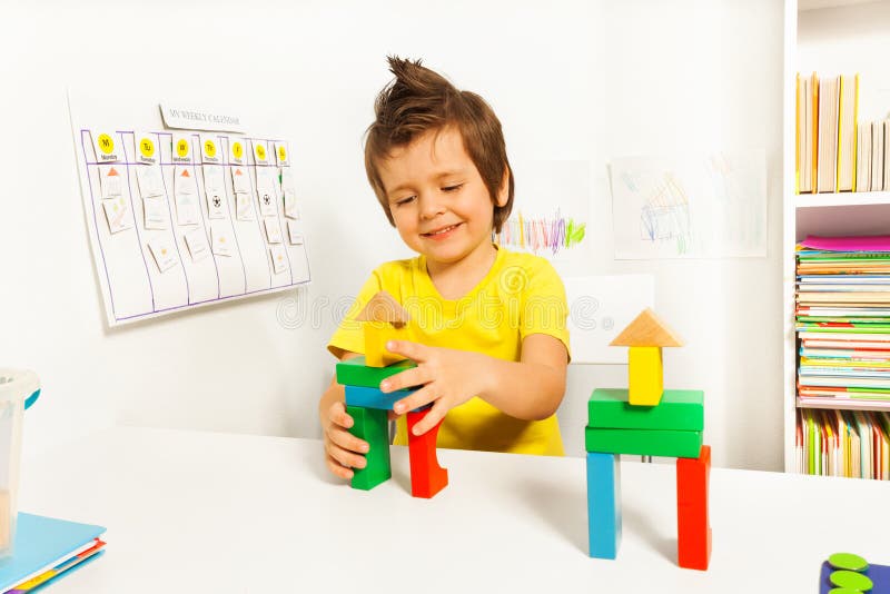 Cute Boy Putting Blocks Replicating Example Stock Image - Image of ...