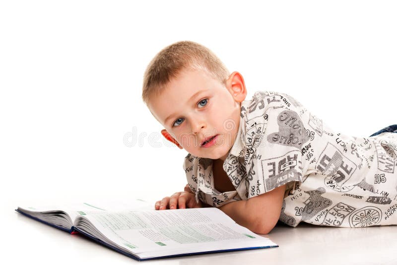 Cute boy reading a book stock image. Image of cheerful - 19212873