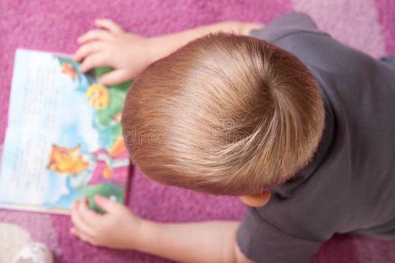 Boy studying a map stock photo. Image of education, keen - 12861860