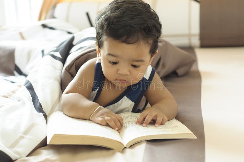 Cute boy reading stock image. Image of lovely, clever - 31809503