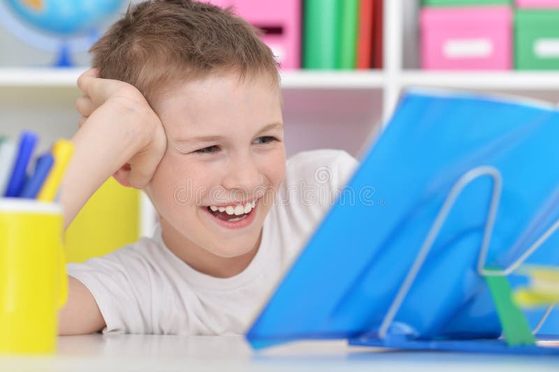 Cute boy reading book stock image. Image of learning - 74182529