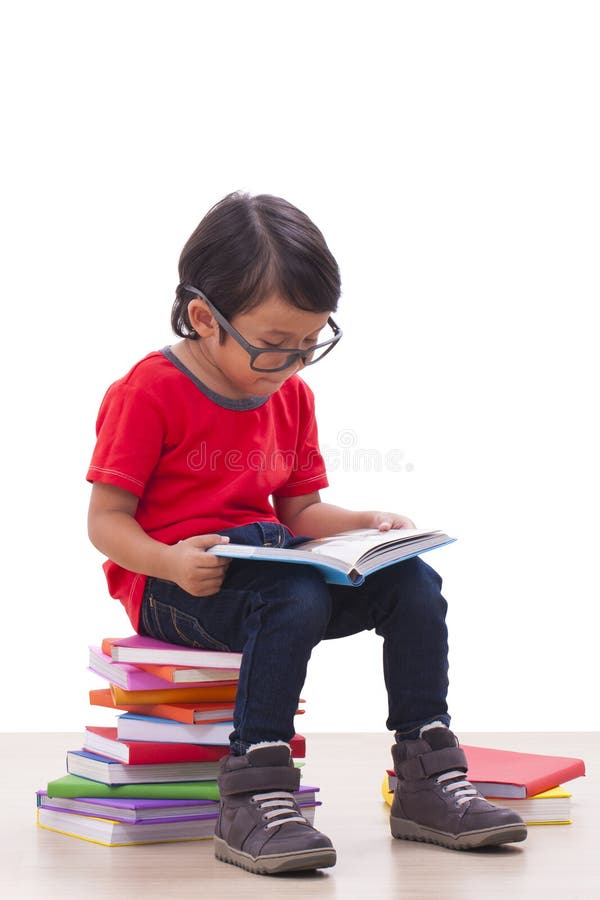 Cute boy reading stock photo. Image of heap, lesson, education - 41463330